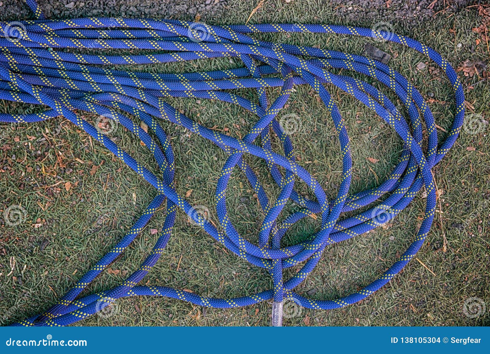Blue Climbing Rope on Green Grass Stock Photo - Image of rope, climb ...