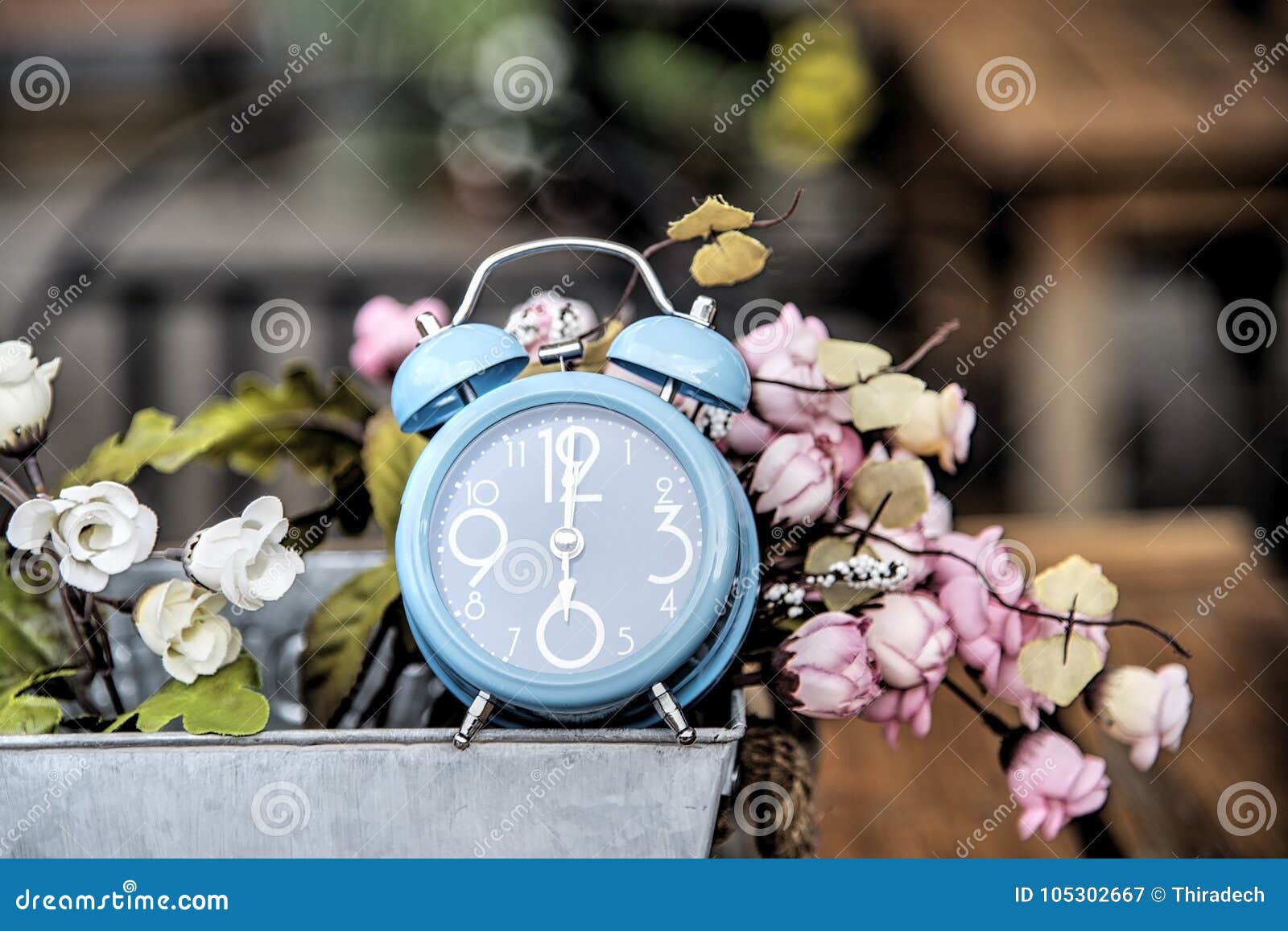 Blue Clock with Artificial Flowers Stock Image - Image of collection ...