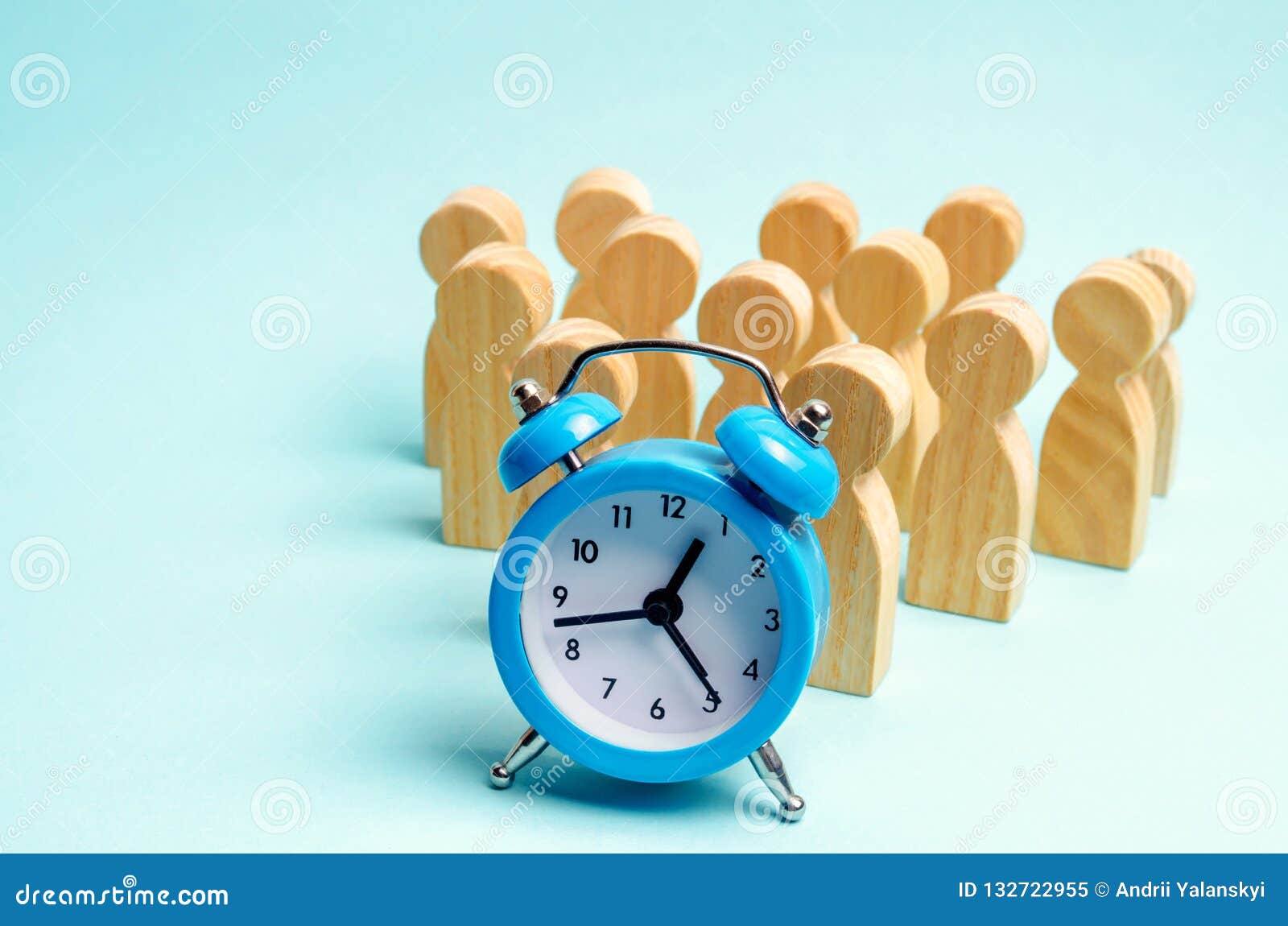 Blue Clock Stand in Front of a Team of Employees. Overtime Increase ...