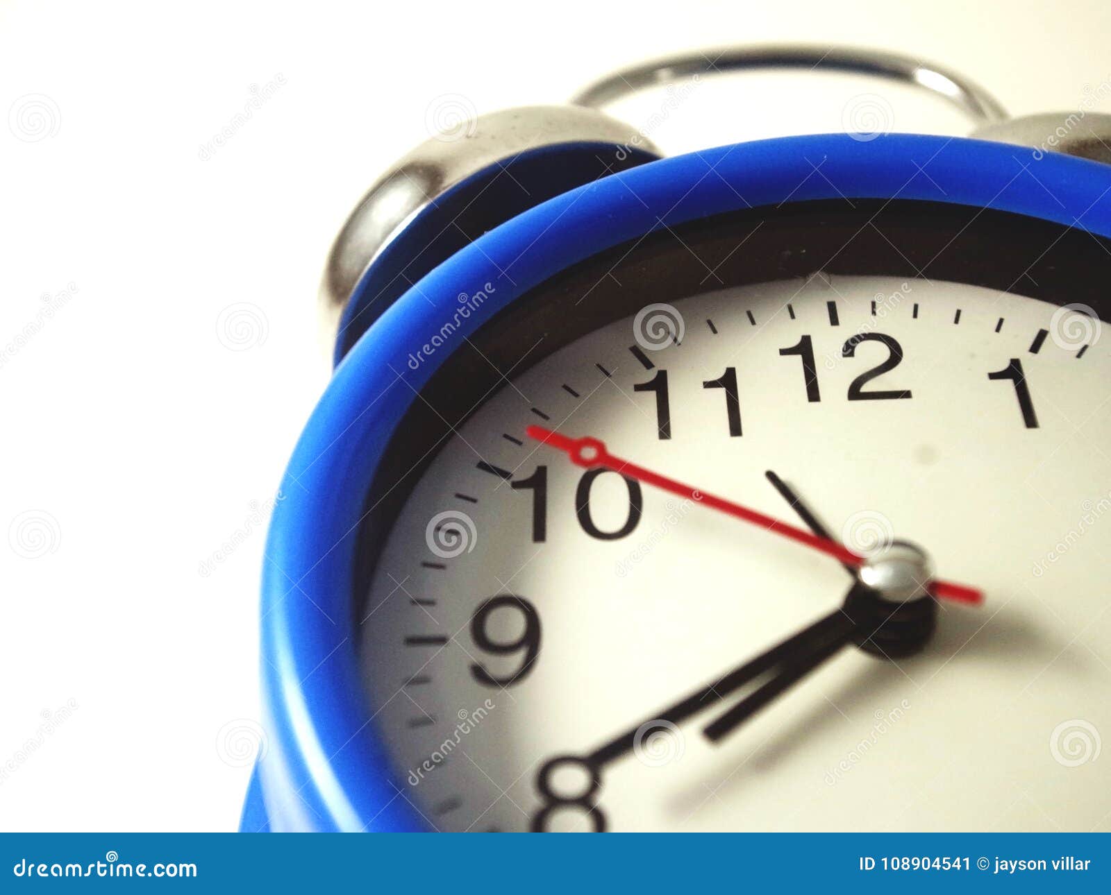 Blue Clock in a White Background Stock Image - Image of telling ...