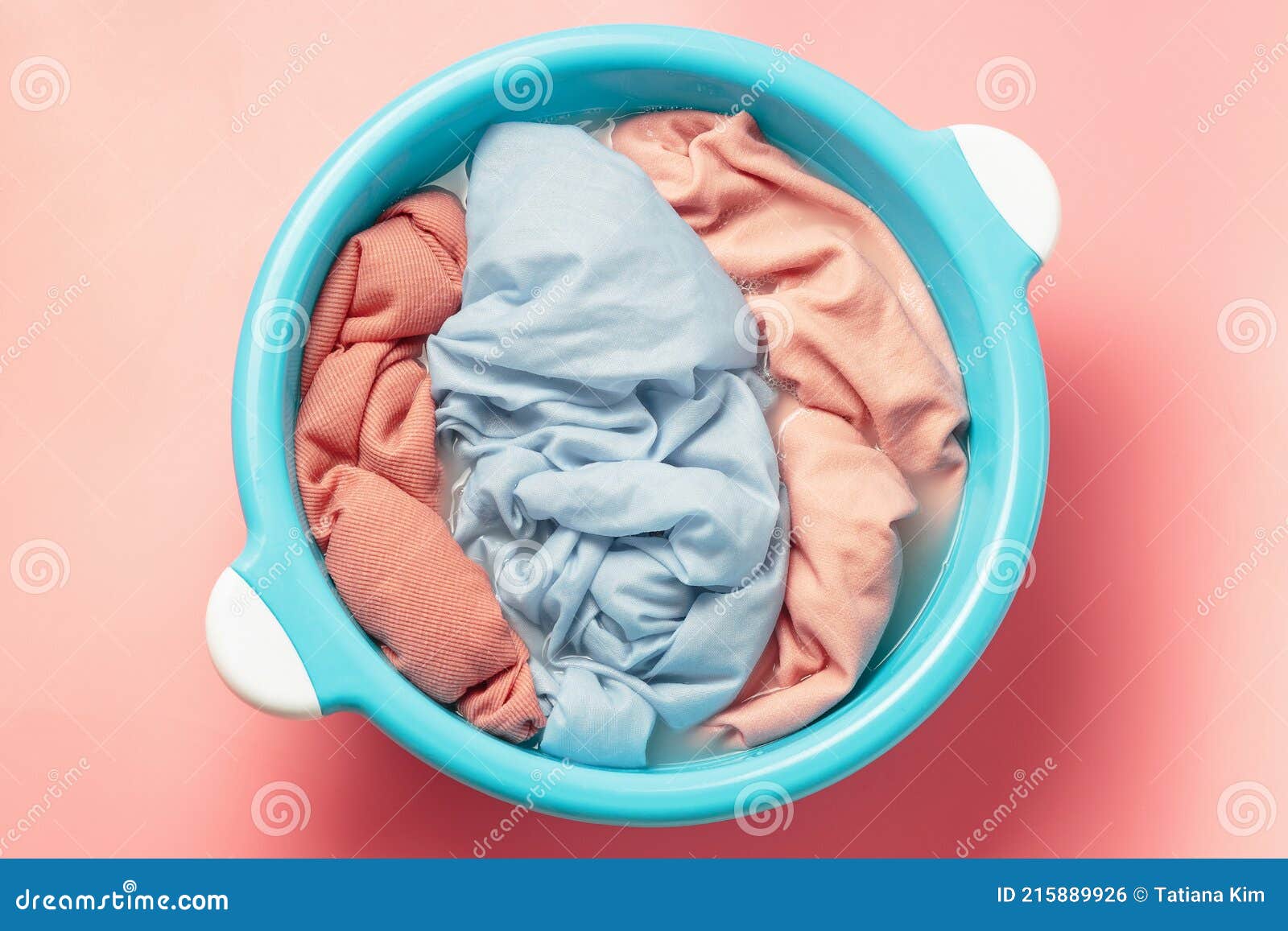 Blue Clothes Washed with Basin with Soap Bubbles, Top View Stock Photo ...