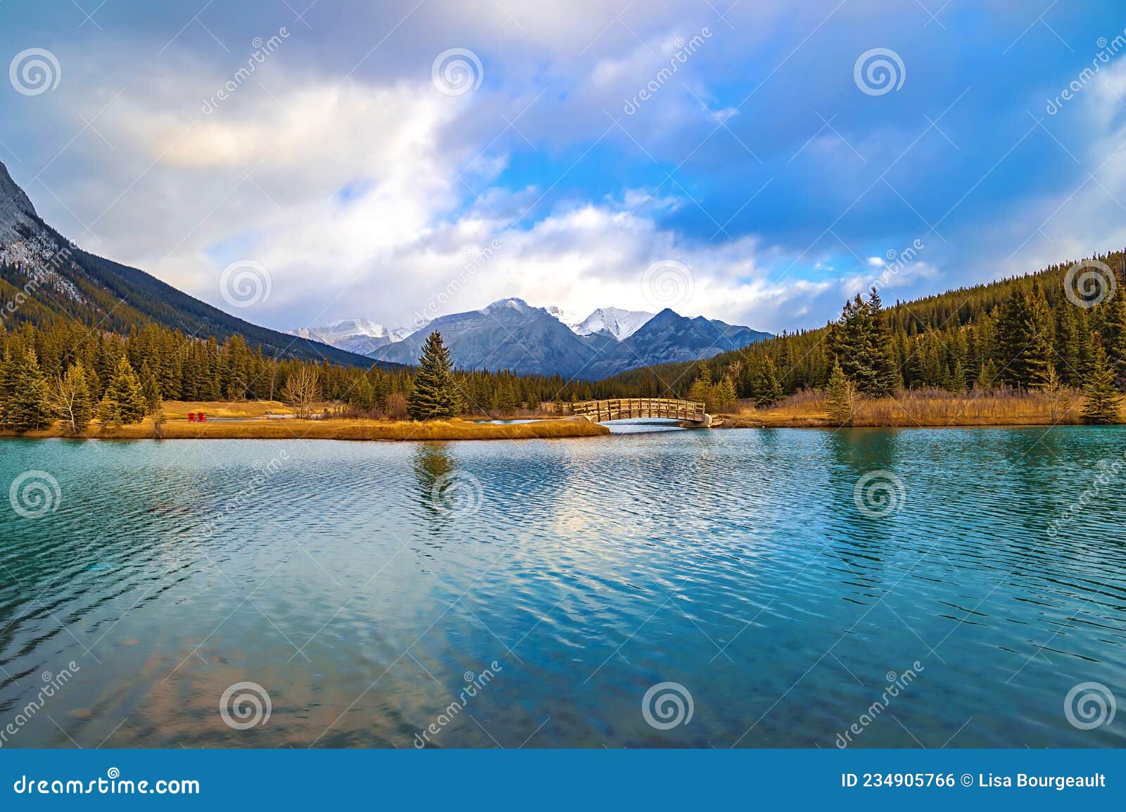 Blue Cloudy Sky Over a Banff Park Stock Photo - Image of cascadeponds ...