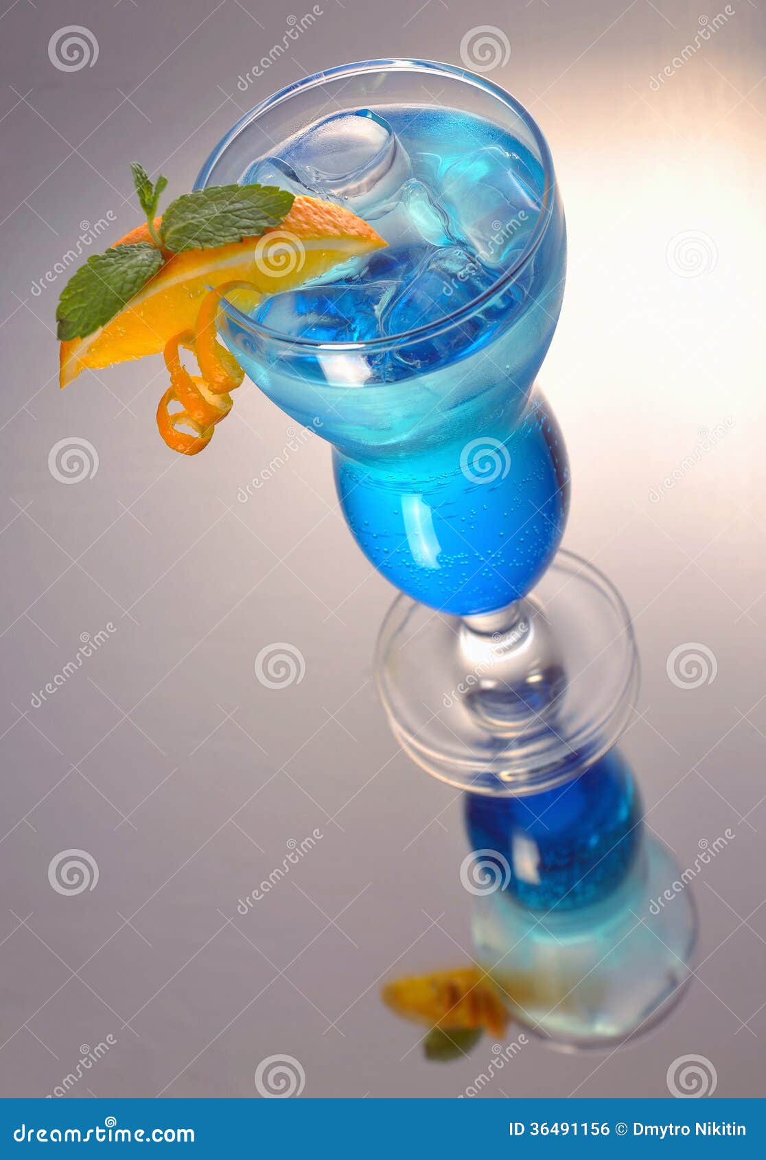 Blue Cocktail with Ice and Orange Stock Photo - Image of fruit ...