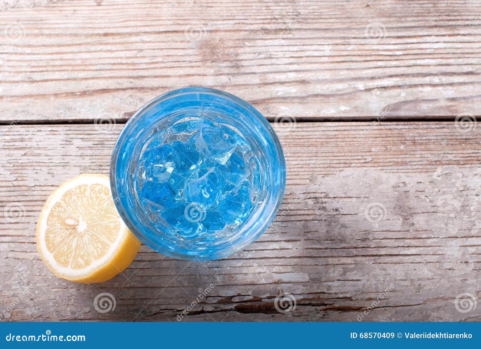 Blue Cocktail with Lemon and Ice Stock Image - Image of food, cube ...