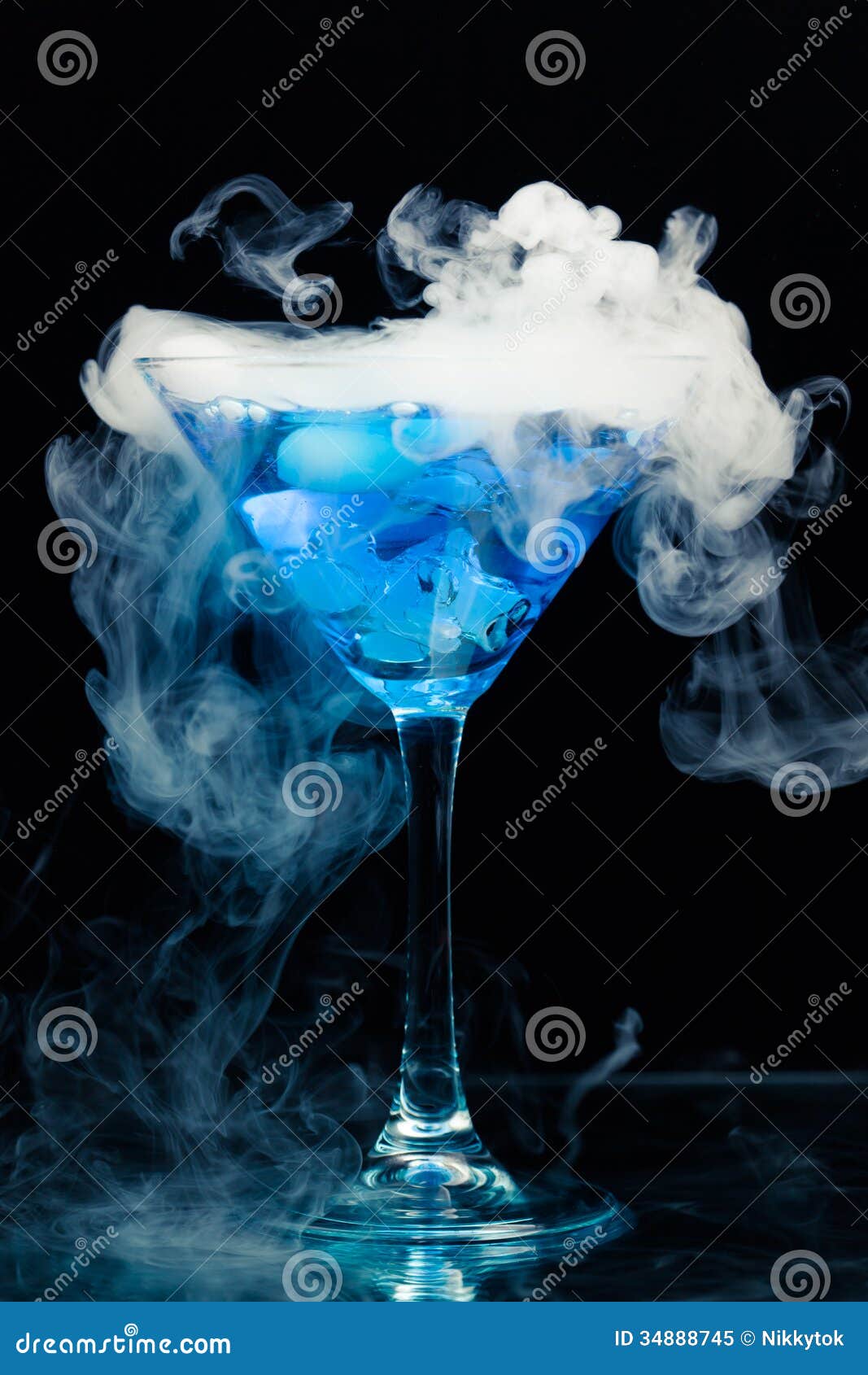 Blue cocktail with splash stock image. Image of martini - 34888745