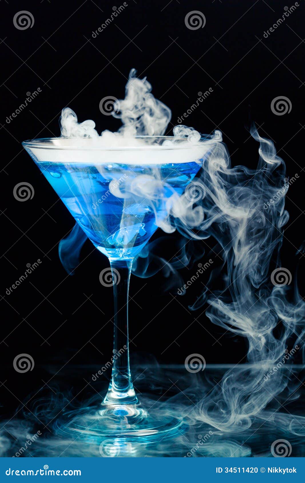 Blue cocktail with splash stock photo. Image of abstract - 34511420