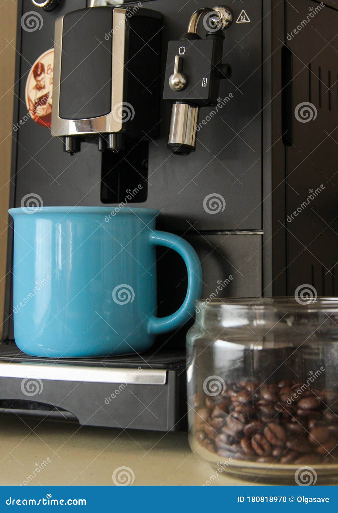 Blue Coffee Mug and Coffee Machine Standing in the Kitchen ...
