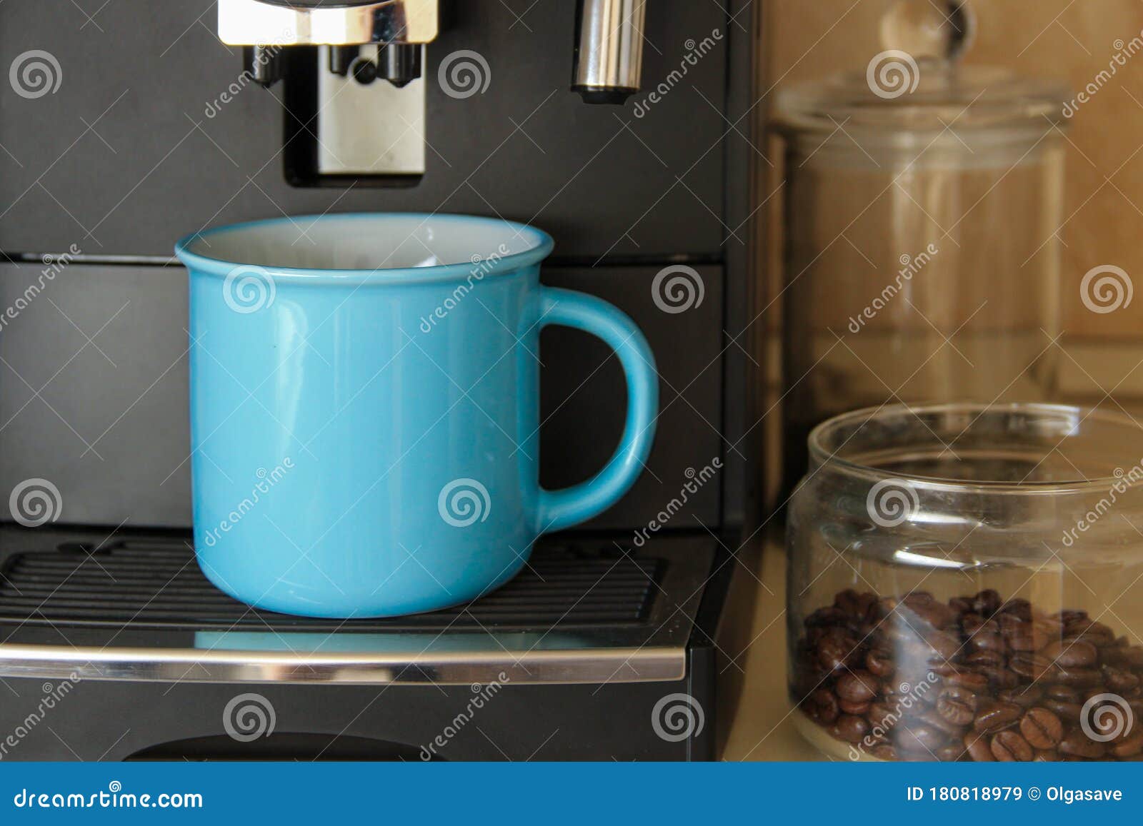Blue Coffee Mug and Coffee Machine Standing in the Kitchen ...