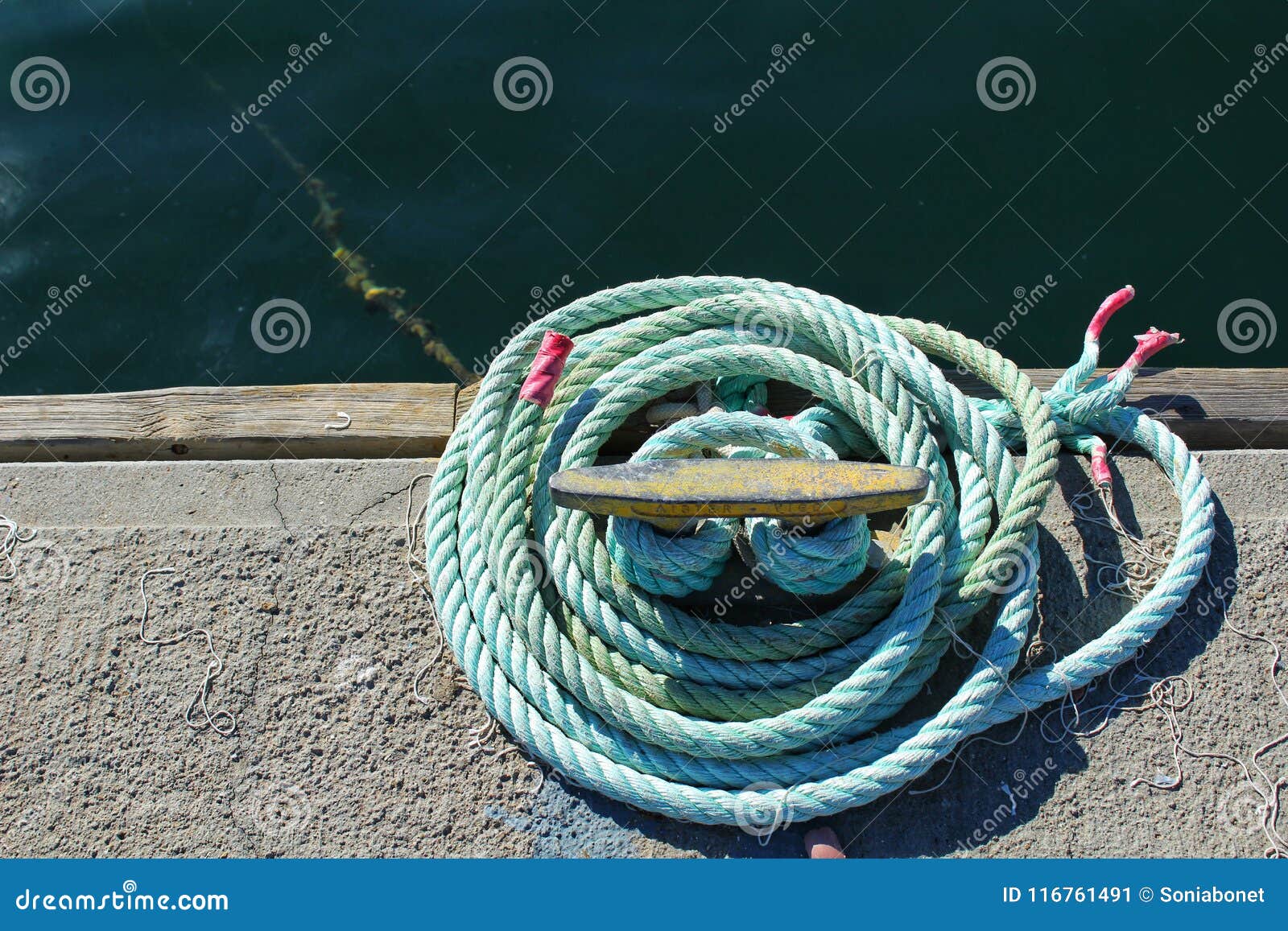 Blue Coiled Rope in the Dock Stock Image - Image of marin, blue: 116761491
