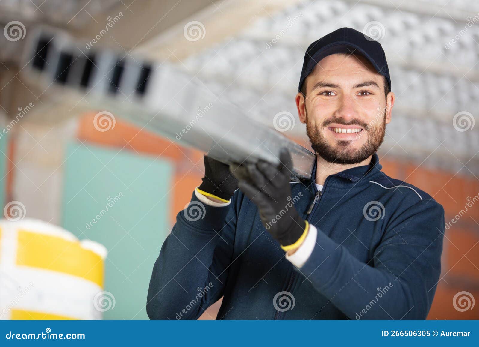 Blue-collar Worker Carrying Heavy Metallic Bar Stock Image - Image of ...
