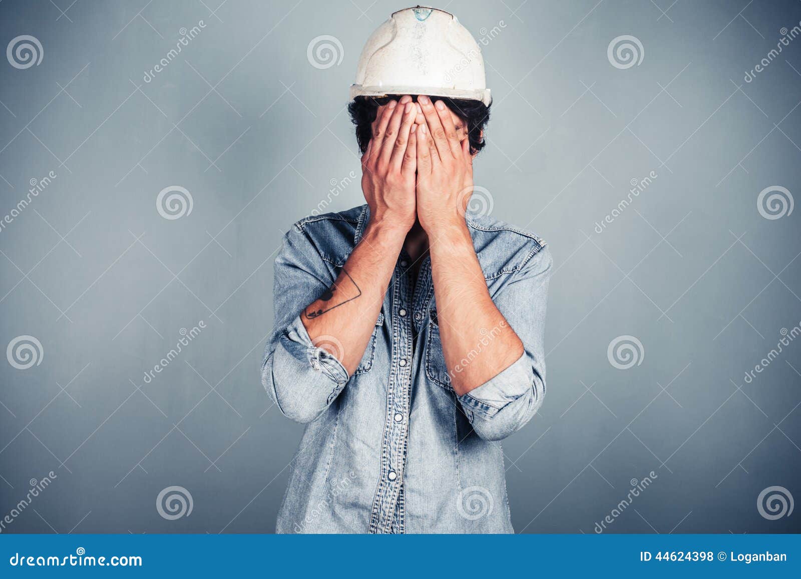 Blue Collar Worker Covering His Face Stock Photo - Image of occupation ...