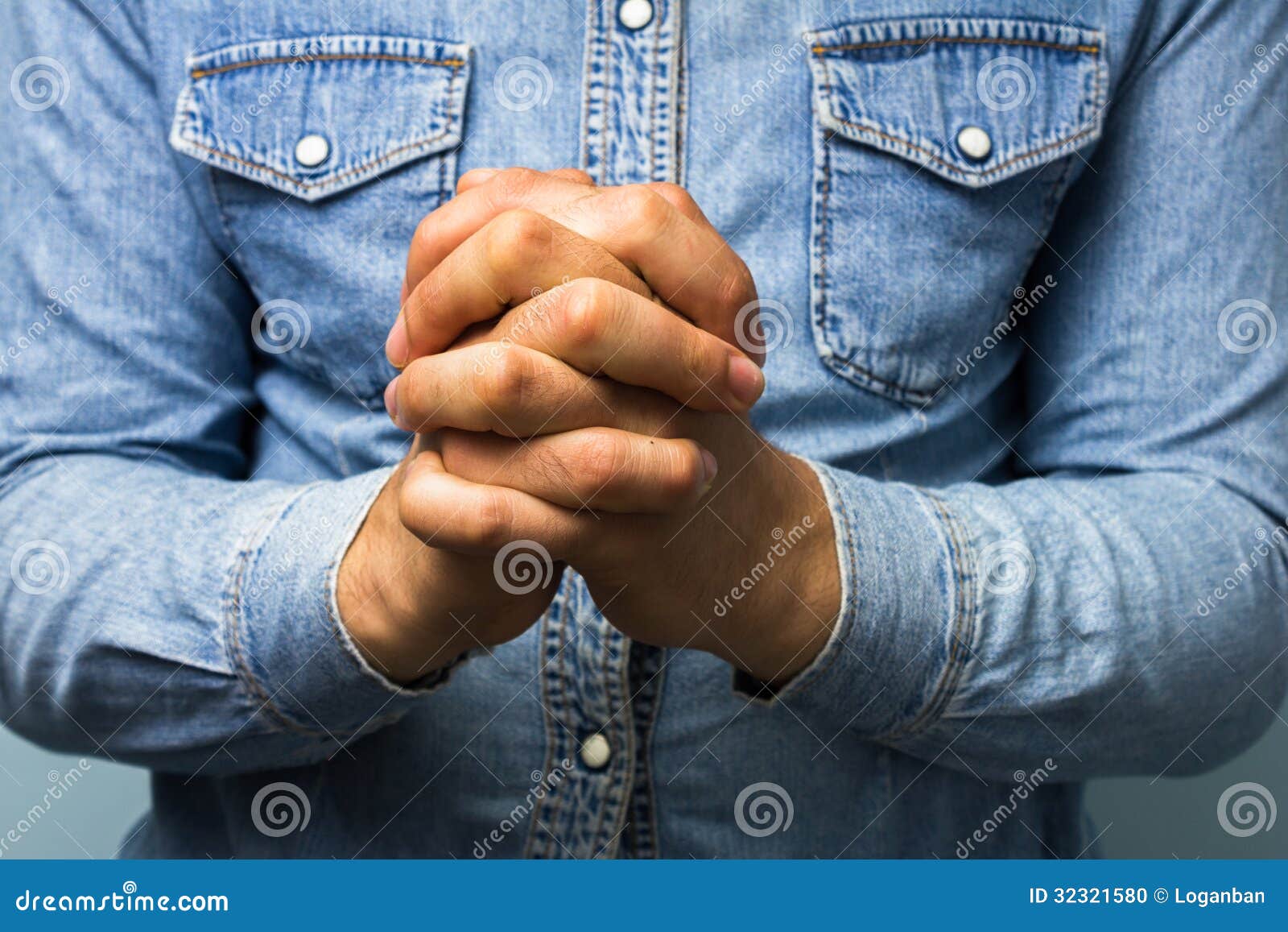 Blue Collar Worker with Hands Folded Stock Photo - Image of denim, blue ...