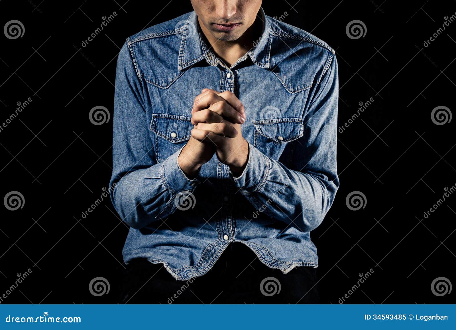 Blue collar worker praying stock image. Image of dark - 34593485
