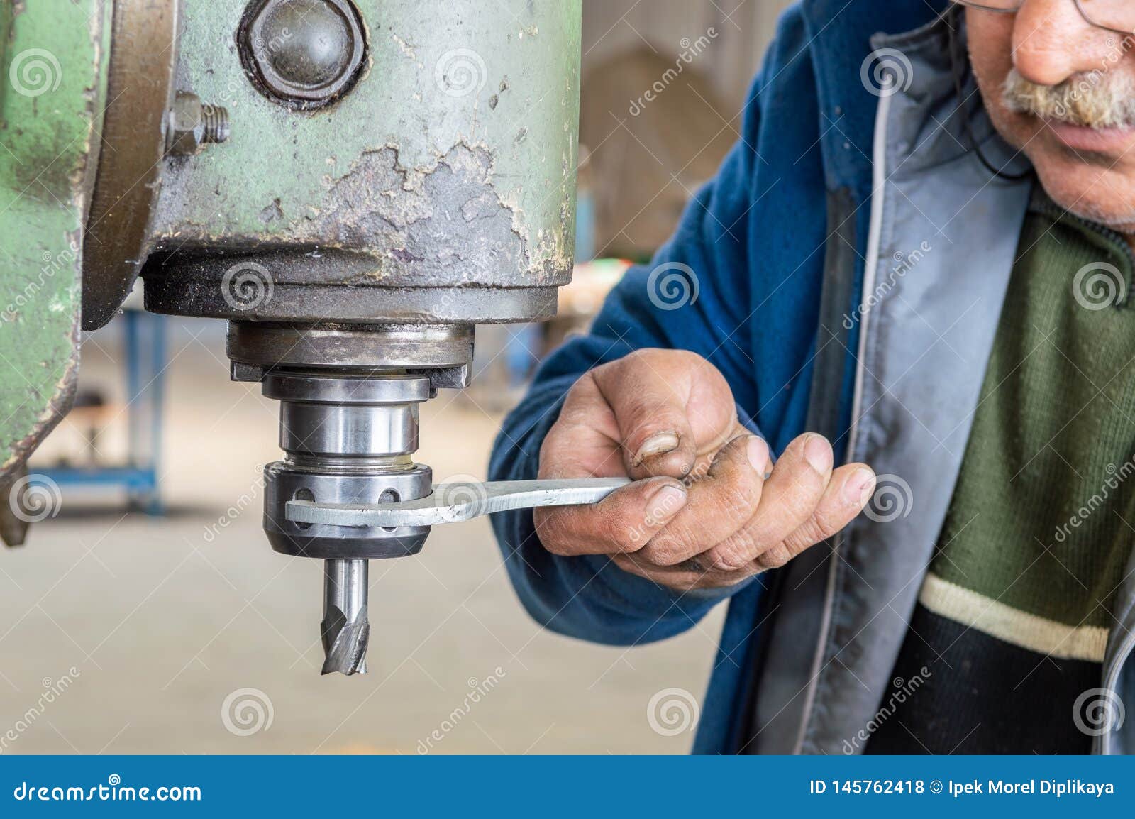 Blue-collar Worker Using Milling Machine in Workshop Stock Photo ...