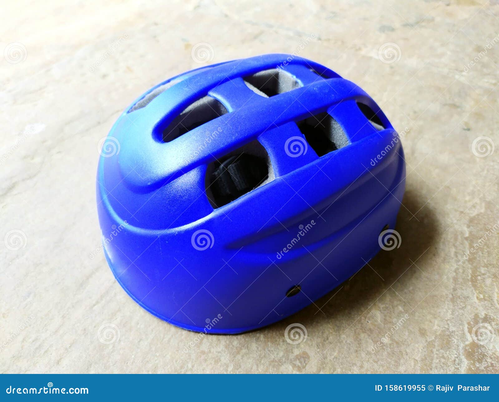 Blue Color Children Helmet on Stone Background Stock Image - Image of ...