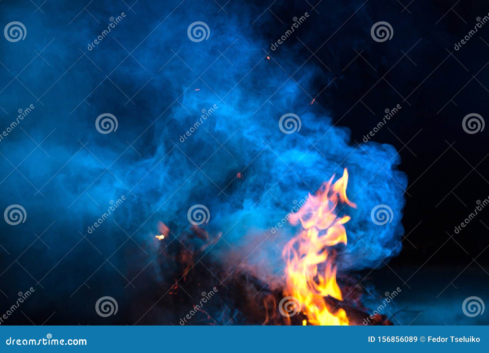 Blue Colored Smoke Wuth Fireflames Stock Image - Image of background ...