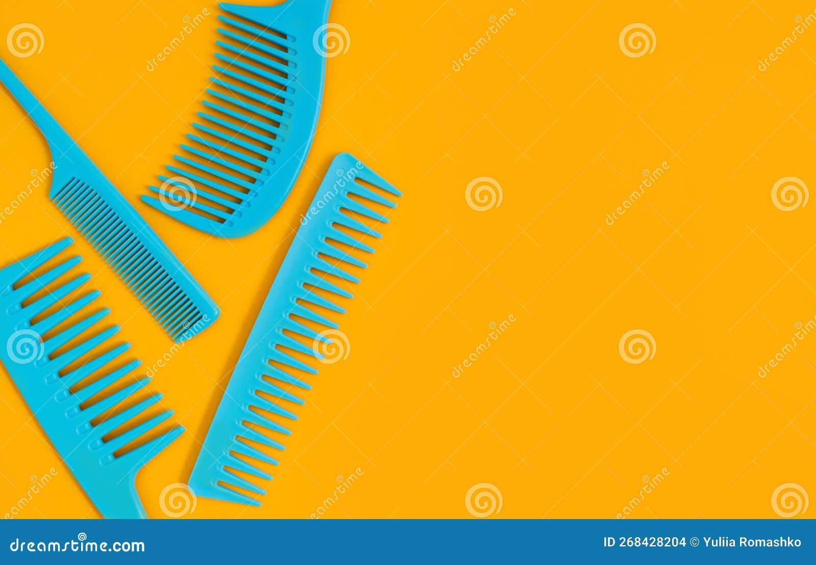 Blue Combs on a Yellow Background. Copy Space. View from Above. Stock ...
