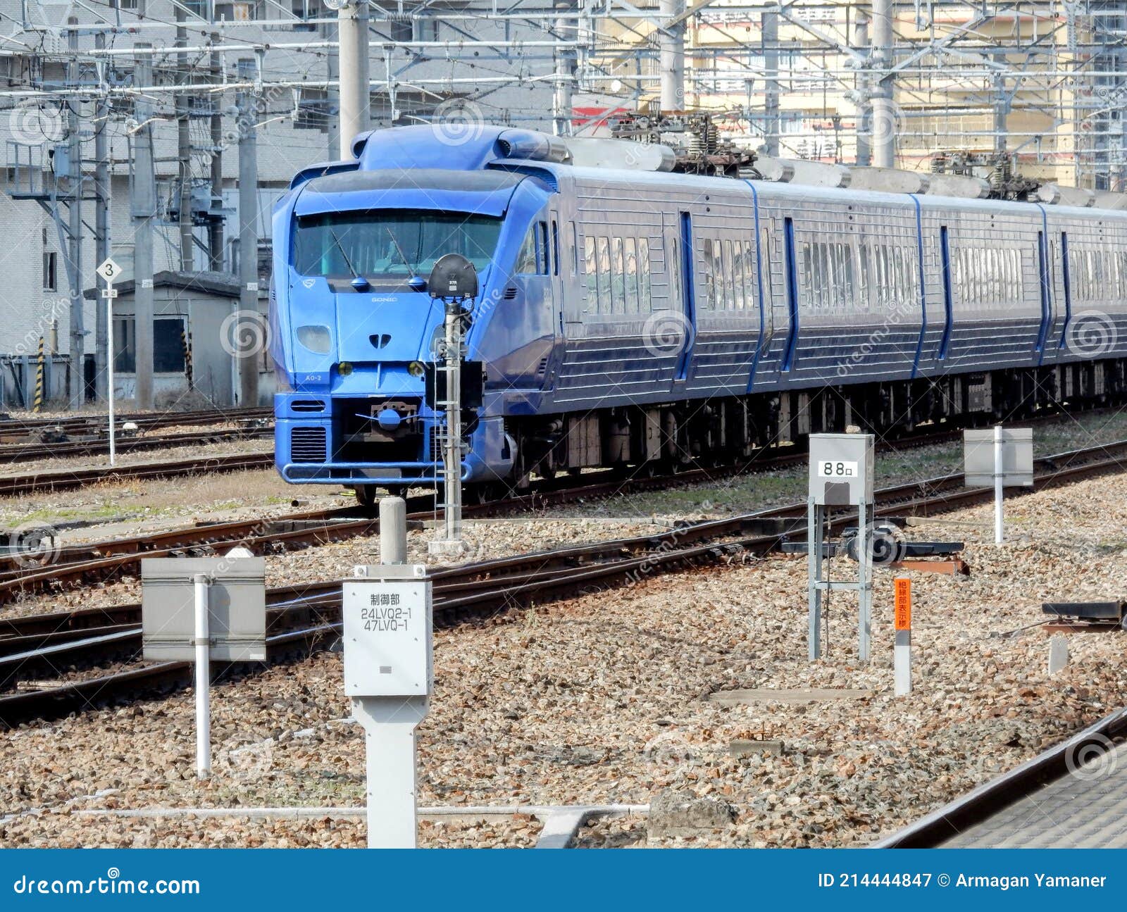 A Blue Commuter Train on Rail Tracks Stock Image - Image of railtracks ...