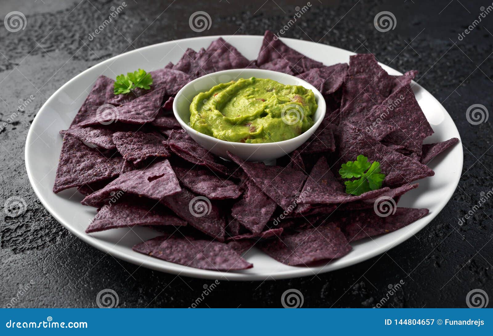 Blue Corn Organic Tortilla Chips with Guacamole Stock Image - Image of ...