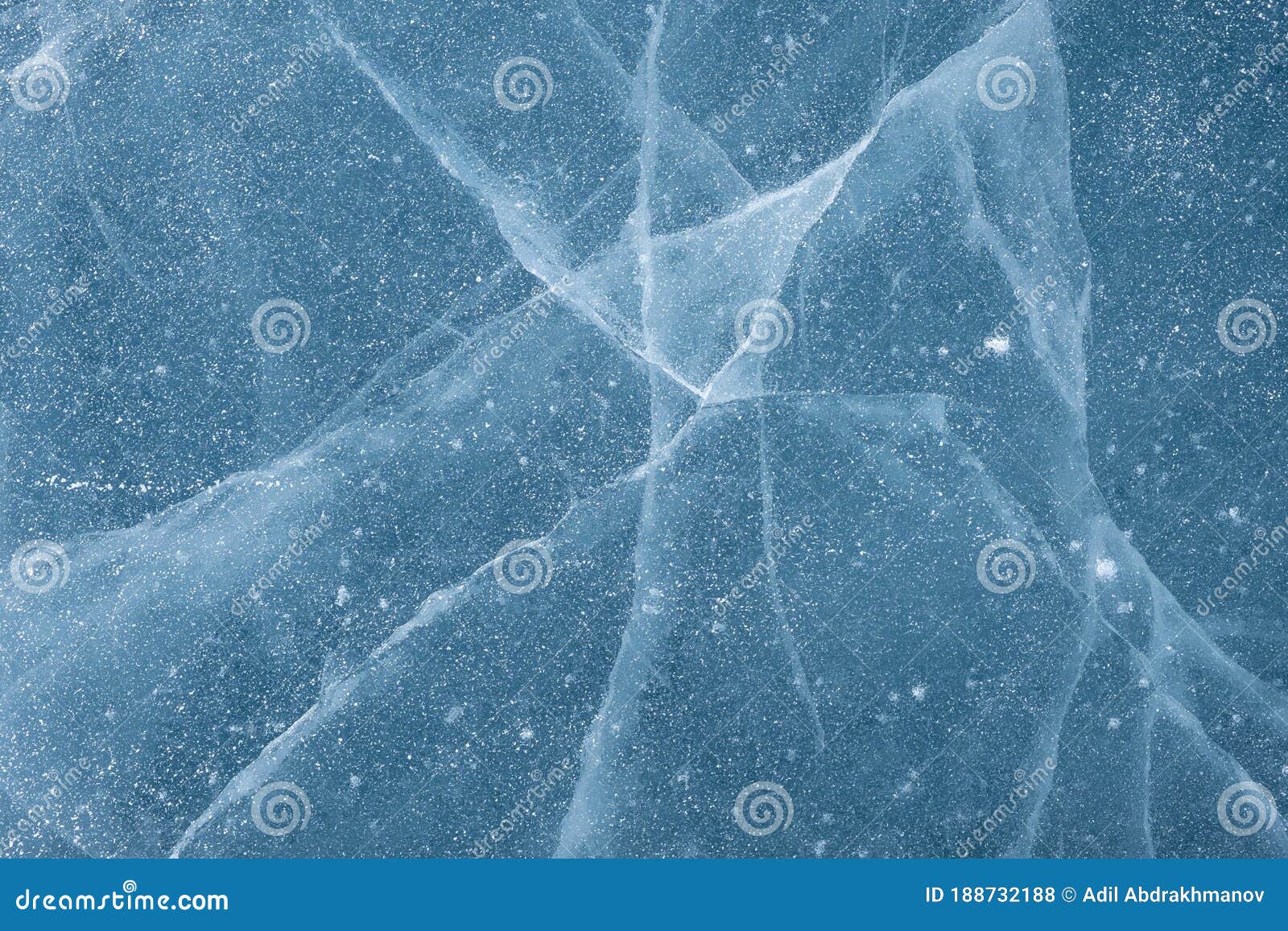 Blue cracked ice with snow stock photo. Image of season - 188732188