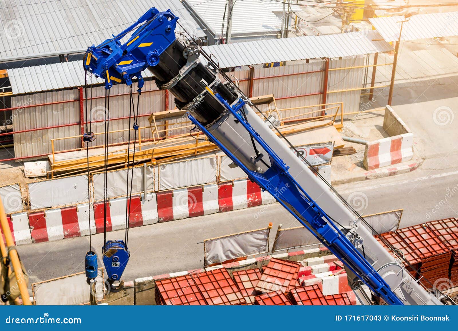 Blue Crane Boom with Hooks and Sling Cable at Construction Site Stock ...