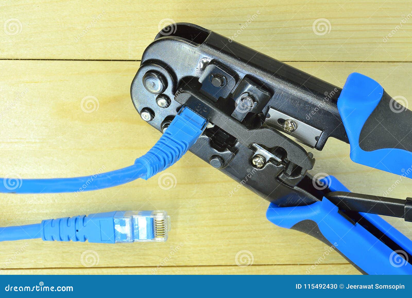 Blue Crimping Tool With A Computer Network Cable Stock Photo ...
