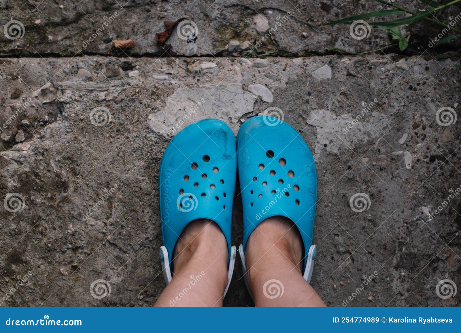 Blue crocs on the legs stock image. Image of girl, footwear - 254774989