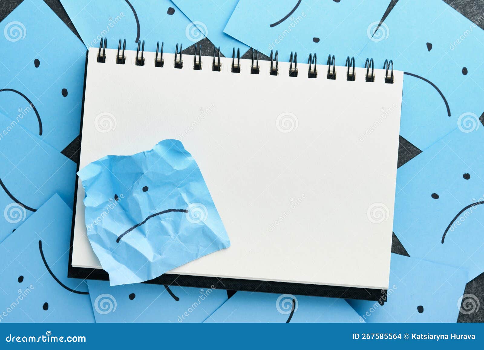 Blue Crumpled Sticky Notes Blank with Drawing Sad Face on Black ...