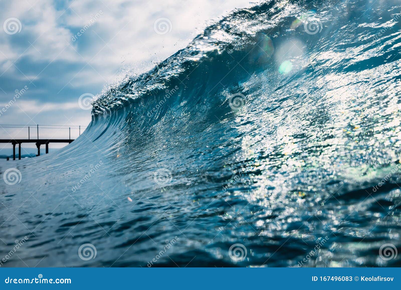 Blue Crystal Wave in Ocean. Breaking Wave and Sun Light Stock Image ...