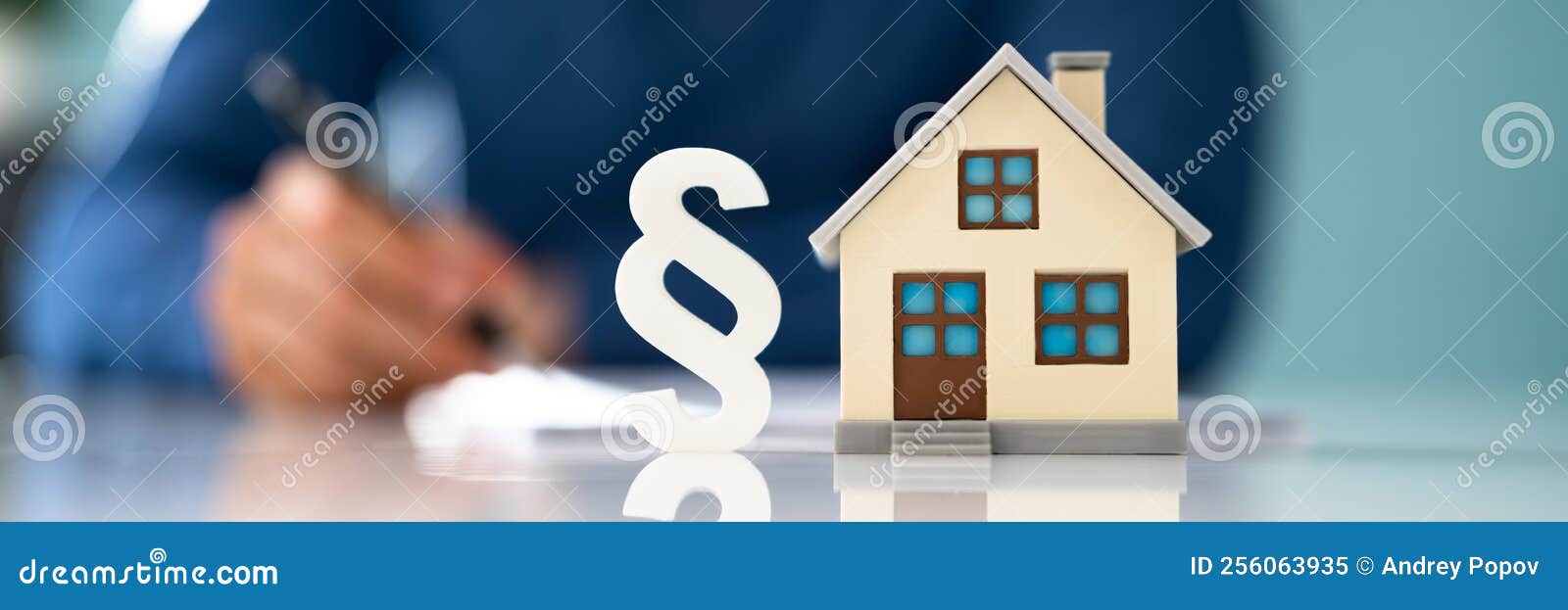 Blue Cubic Block with Paragraph Symbol Inside House Model Stock Image ...