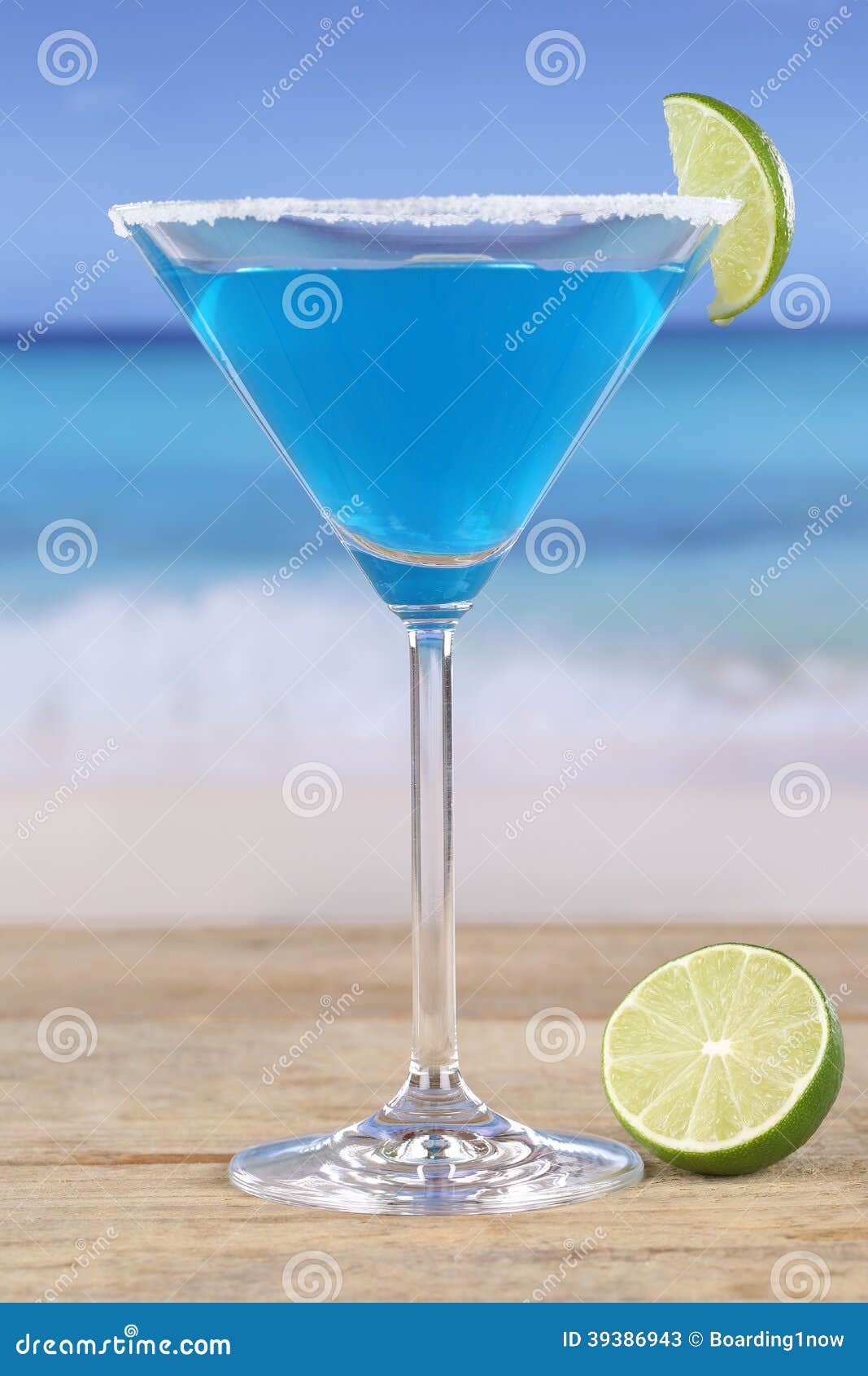 Blue Curacao Cocktail on the Beach Stock Image - Image of beverage ...