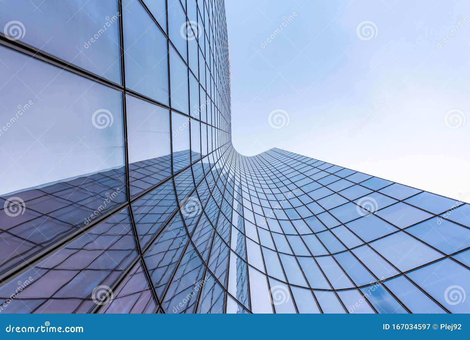 Blue Curved Glass Skyscraper Facade Against Sky Stock Image - Image of ...