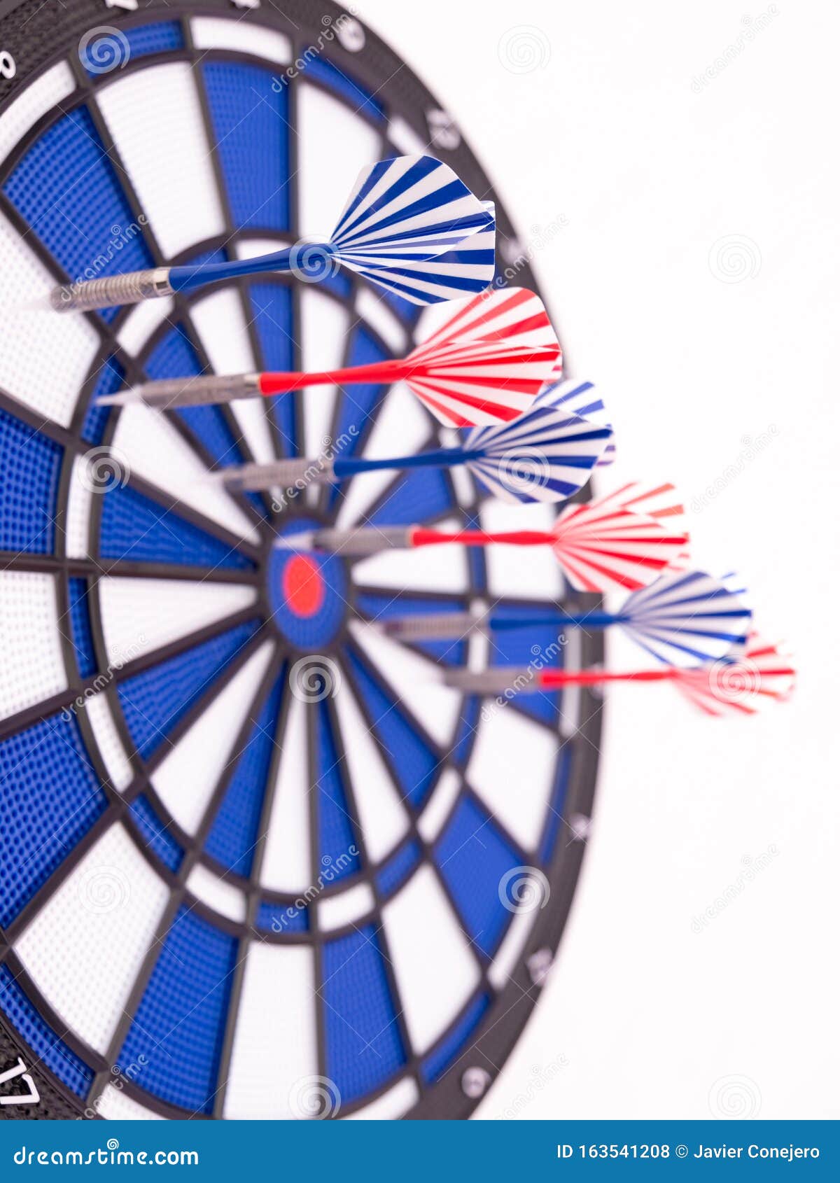 Blue dartboard with darts stock photo. Image of competition - 163541208