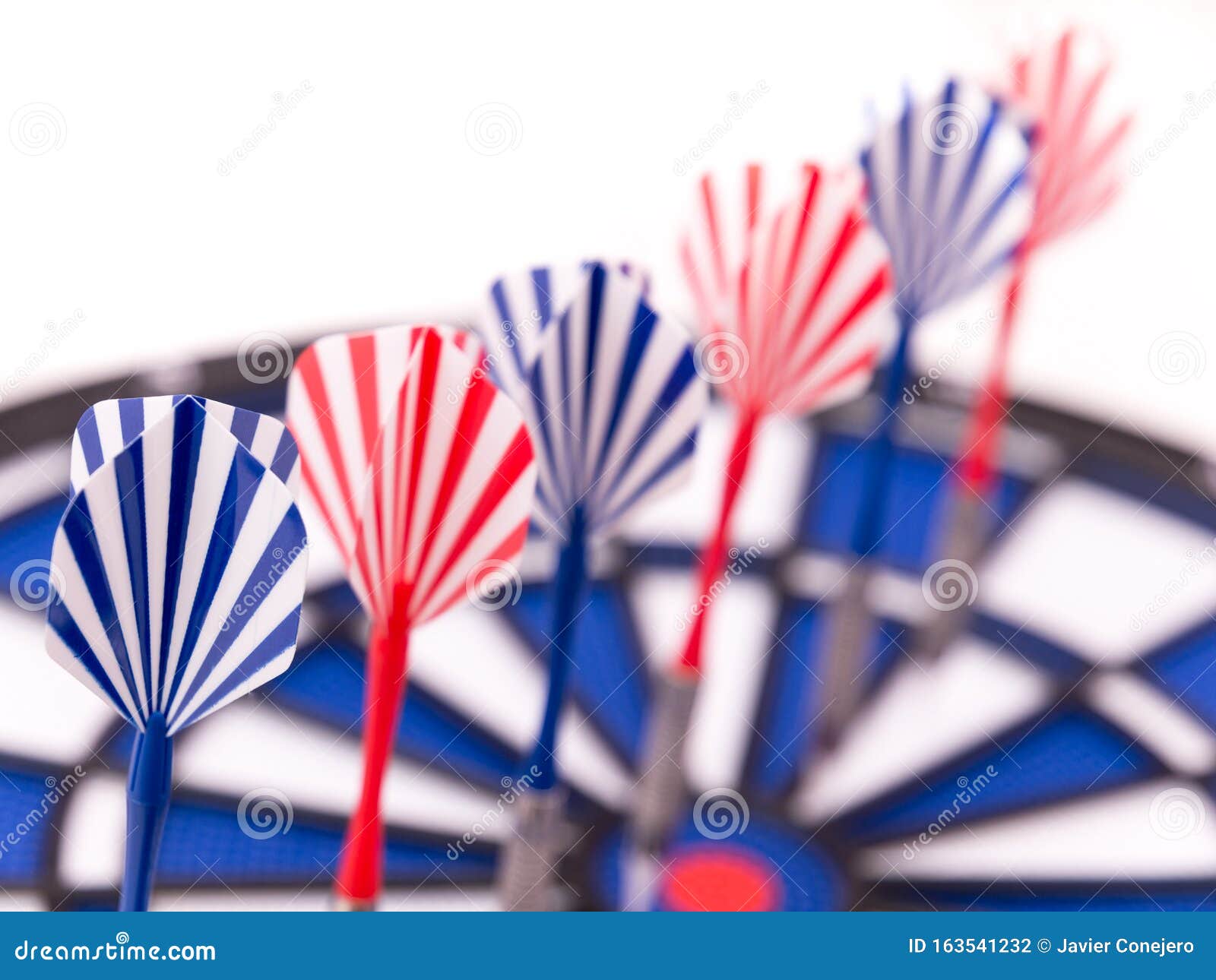 Blue dartboard with darts stock photo. Image of entertainment - 163541232
