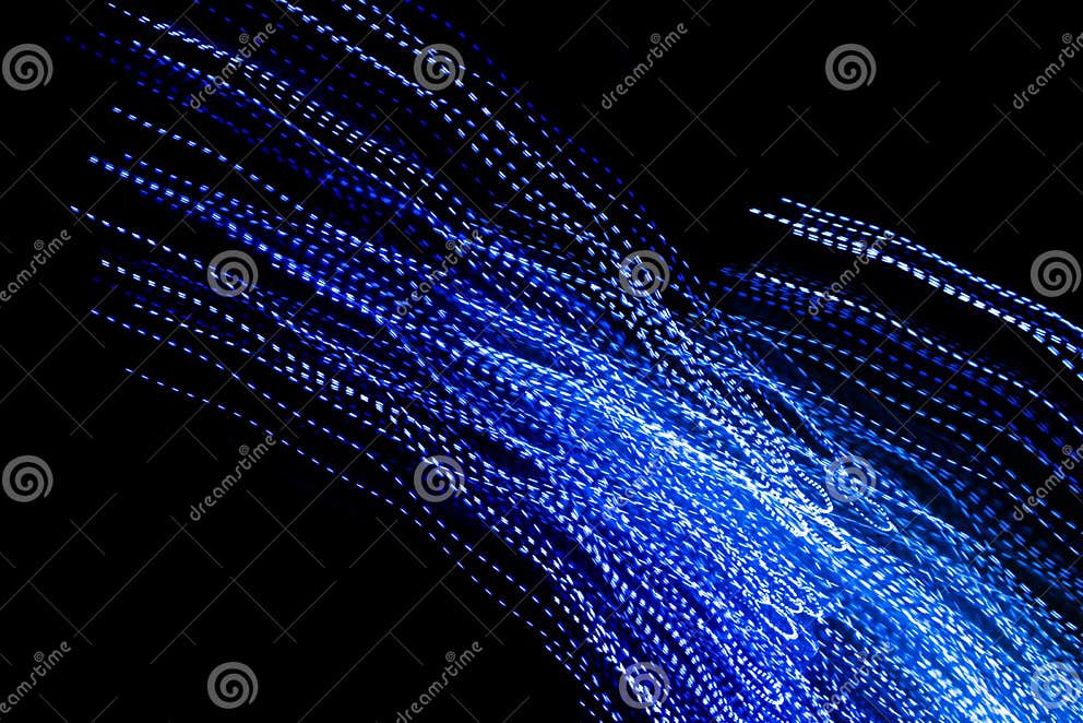 Blue Dashed Lines of Lights on a Black Background Stock Photo - Image ...