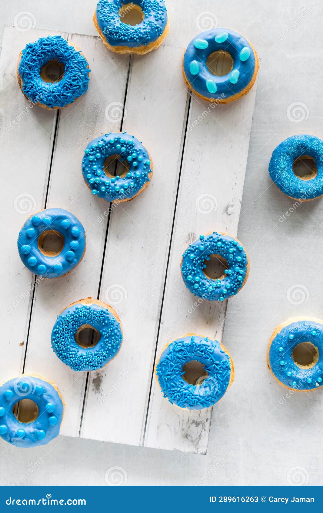 Blue Decorated Donuts Against a White Background. Stock Image - Image ...