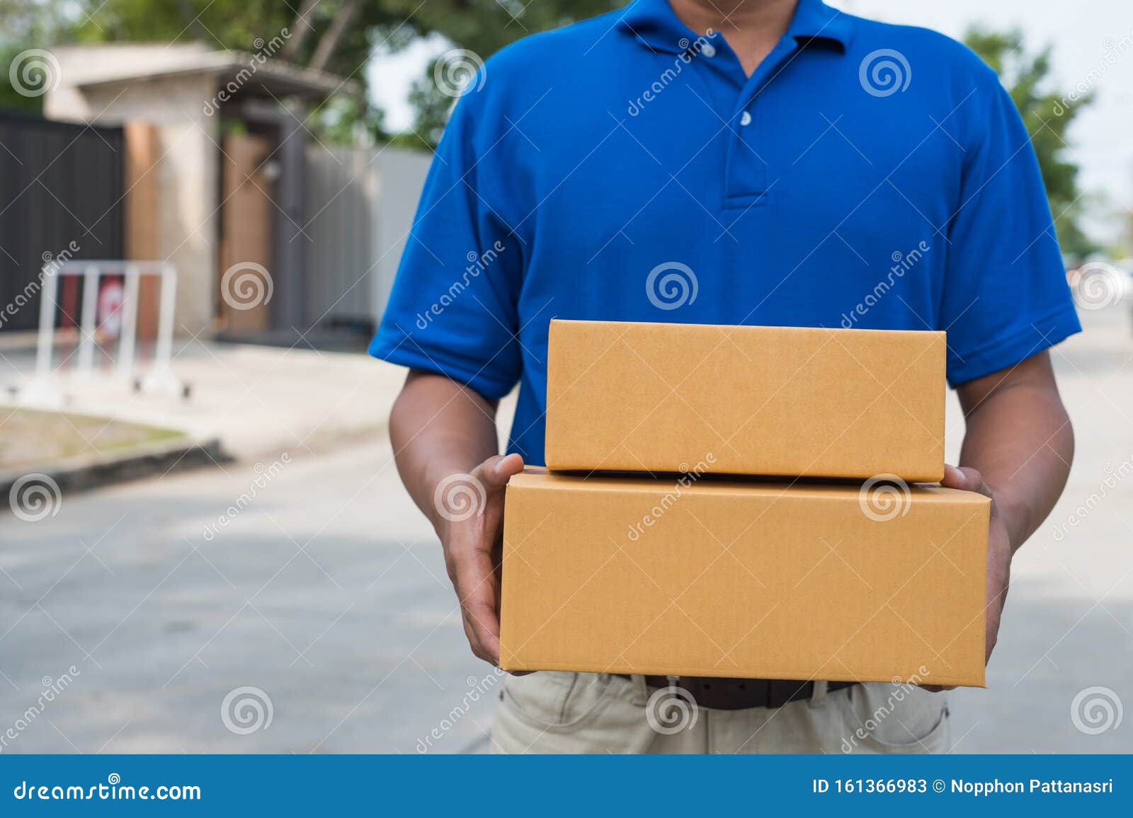 Blue Delivery Men Unloading Package From Truck Stock Photography ...