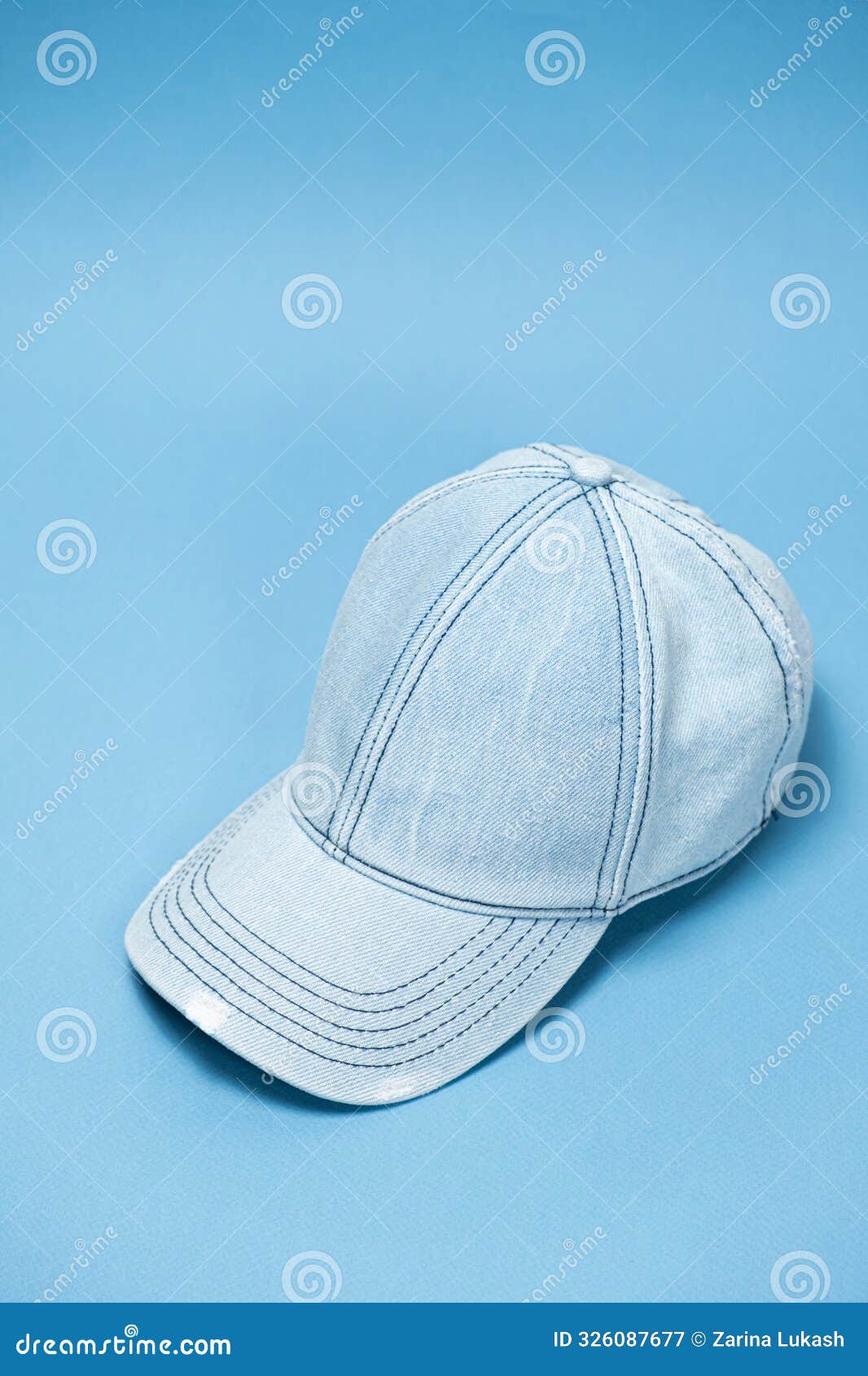 Blue Denim Cap Close-up on Blue Background. Stock Image - Image of ...