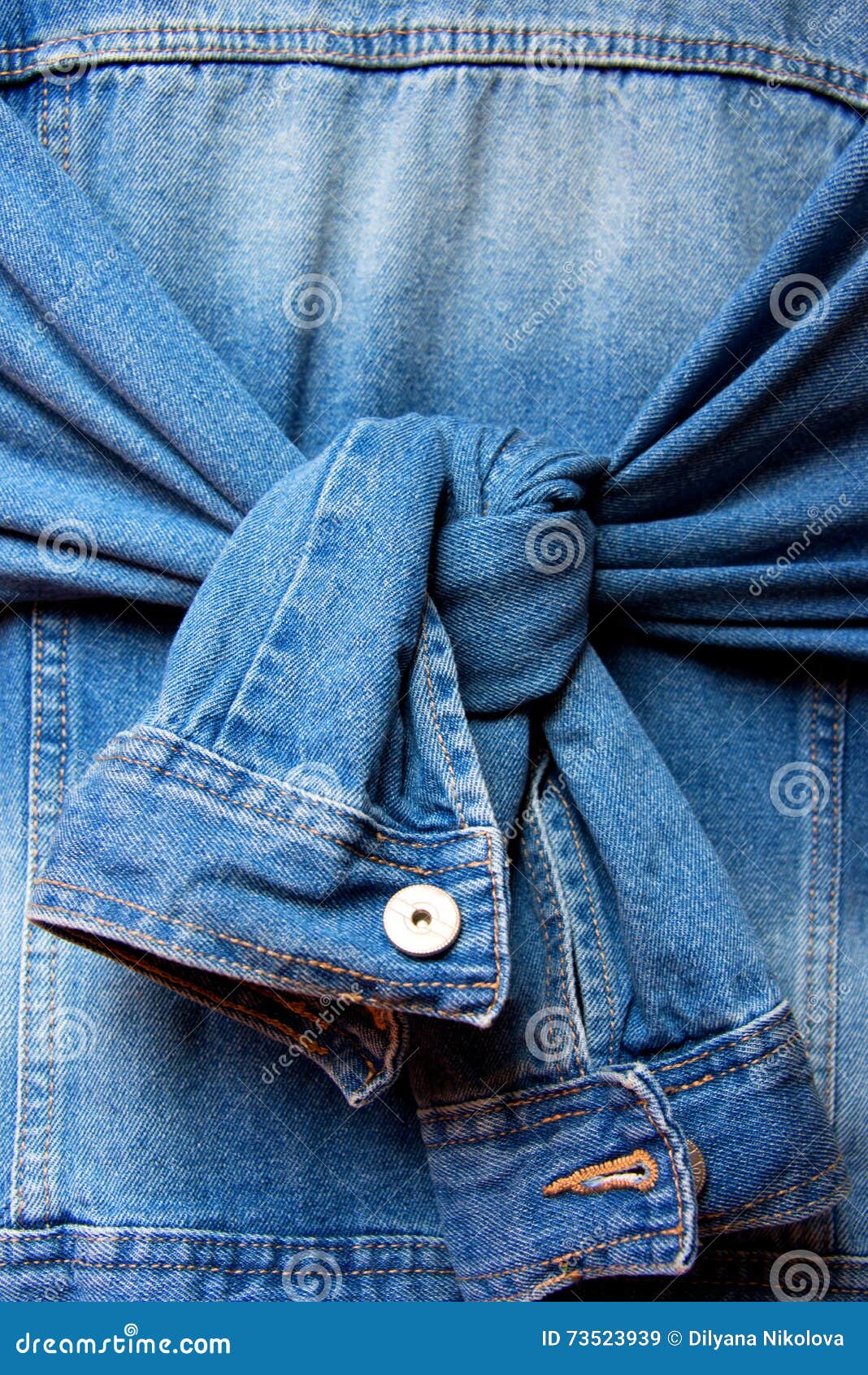 Blue Denim Jacket with Knot Tied Sleeves Stock Image - Image of pattern ...