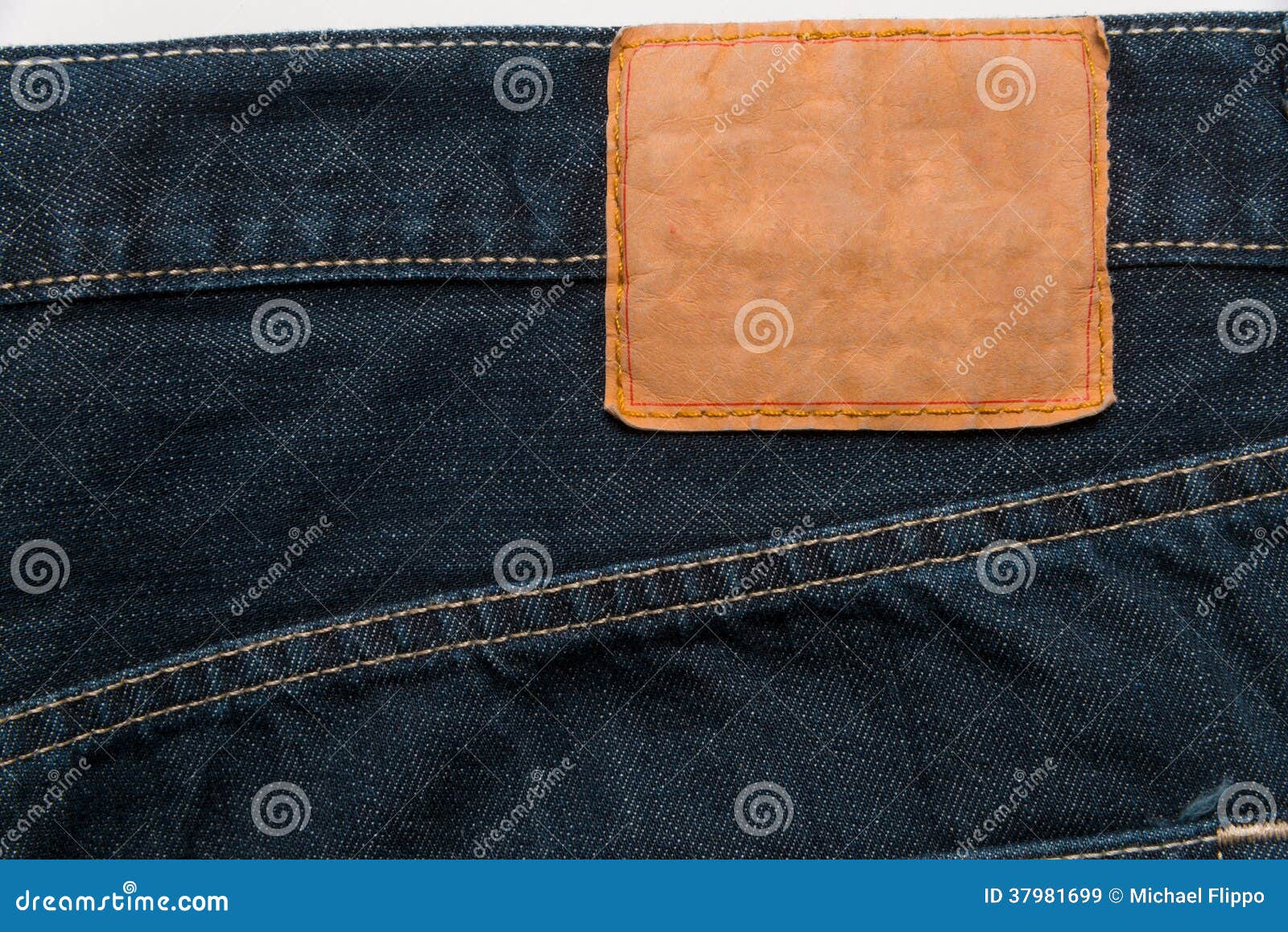 Blue Denim Jeans with Label As a Background Stock Image - Image of ...