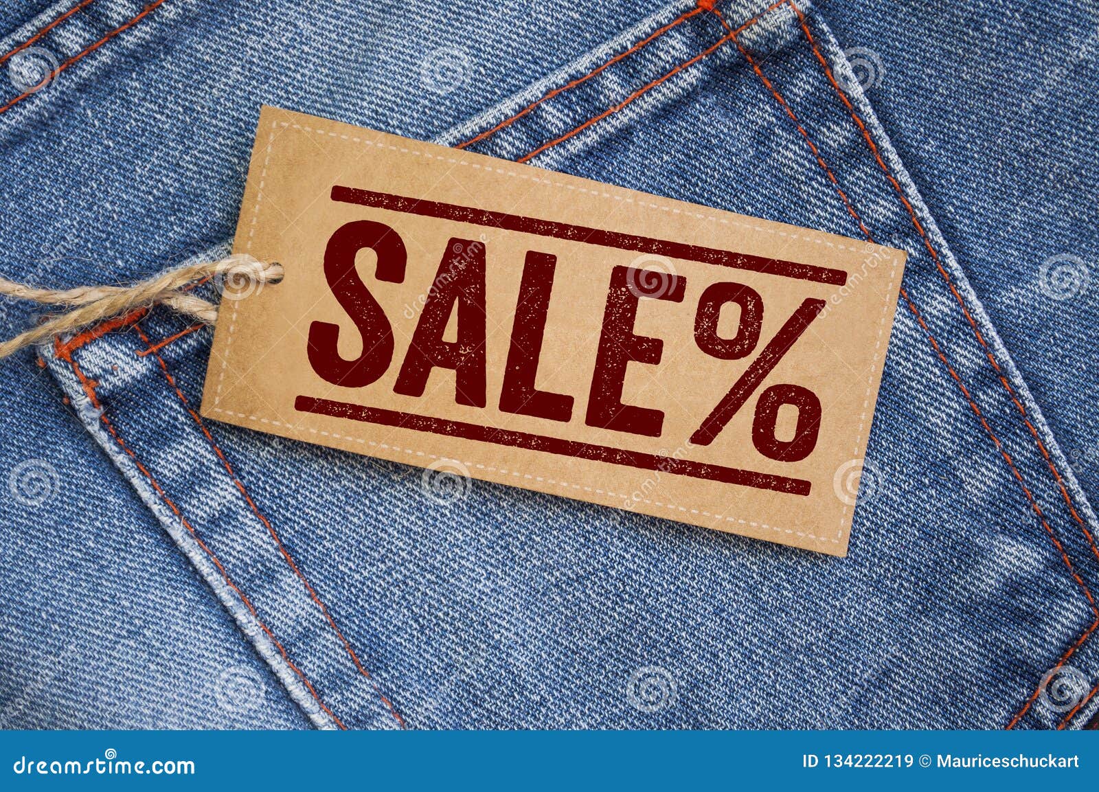 Blue denim jeans with tags stock image. Image of offer - 134222219