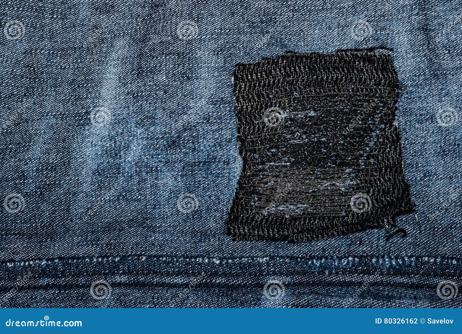 Blue denim with a patch. stock photo. Image of pants - 80326162