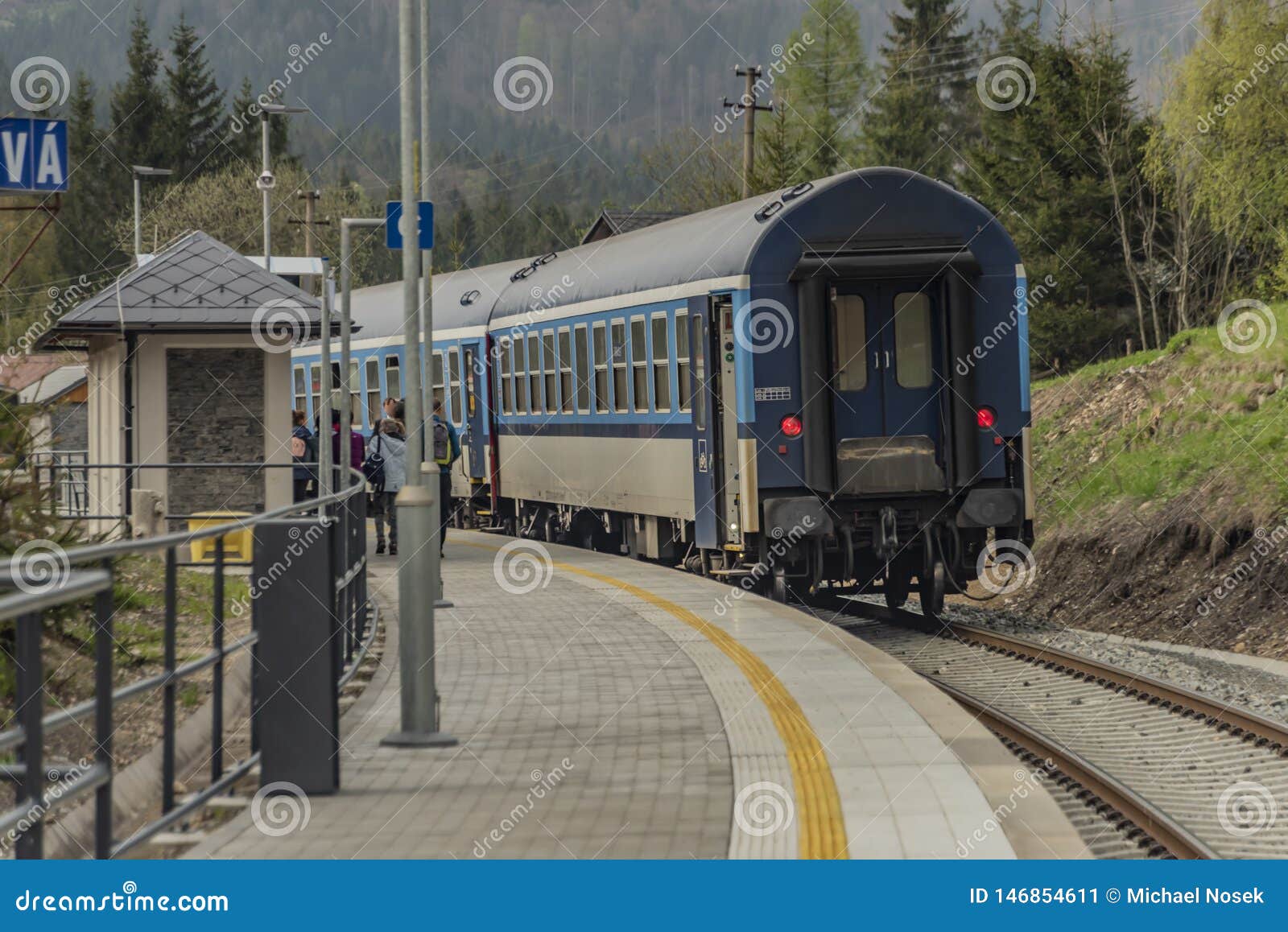 Blue Diesel Train with Passengers Coach in Jeseniky Mountains Editorial ...