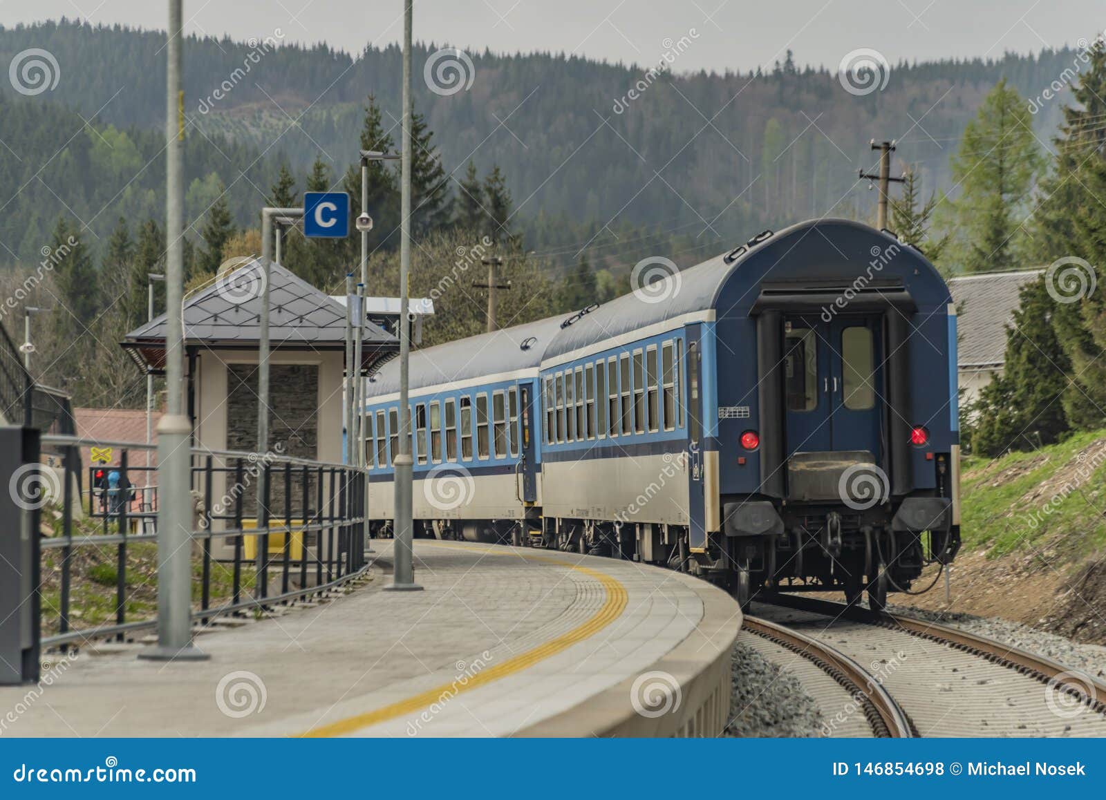 Blue Diesel Train with Passengers Coach in Jeseniky Mountains Stock ...