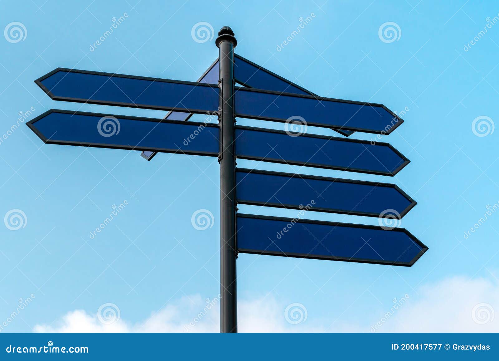 Blue Directional Signs Over Cloudy Sky Stock Image - Image of ...