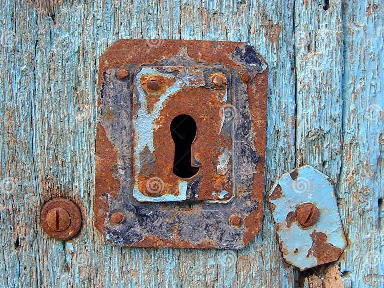 Blue door with keyhole stock image. Image of destroy, colors - 27445