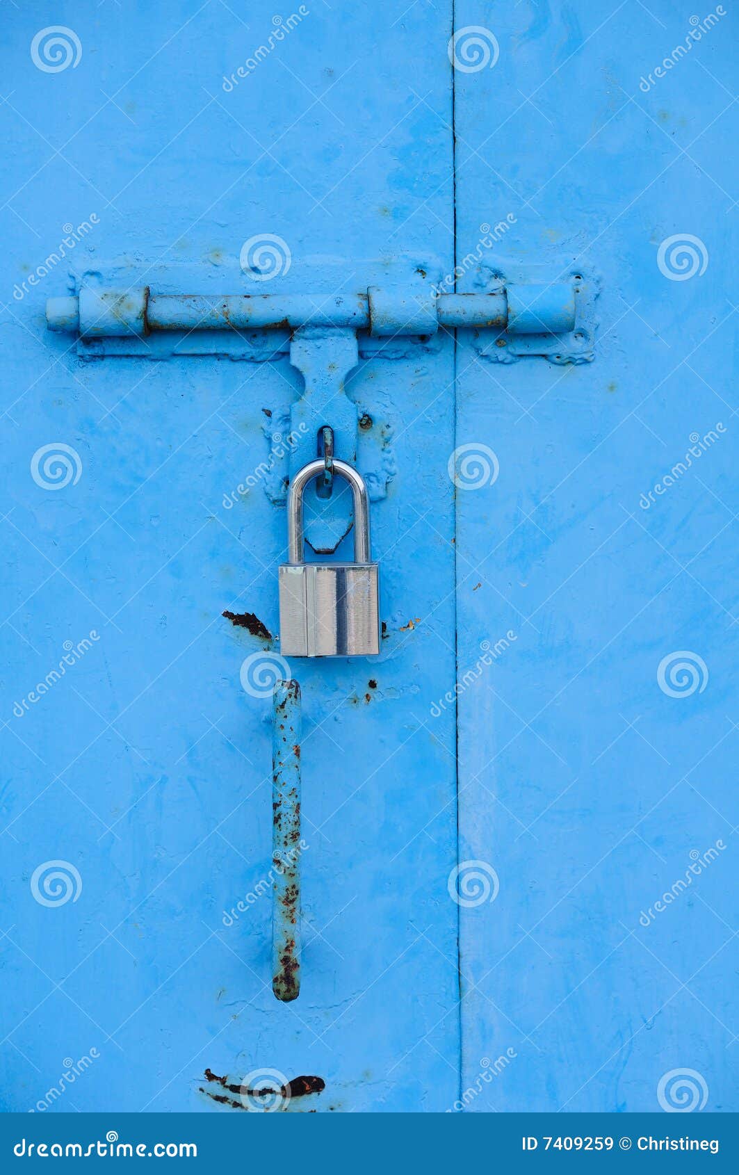 Blue door and lock stock image. Image of grungy, closed - 7409259