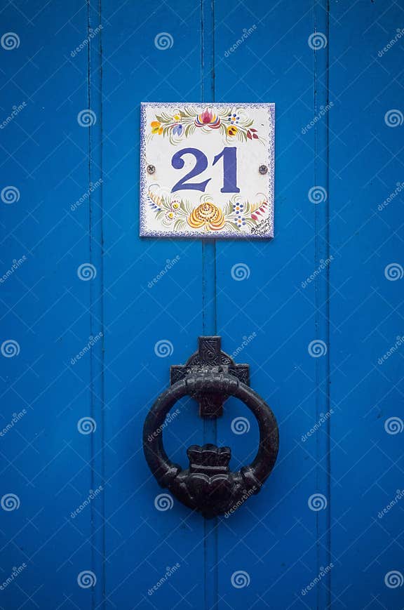 Blue Doors with 21 Digit and Knocker Stock Photo - Image of blue ...
