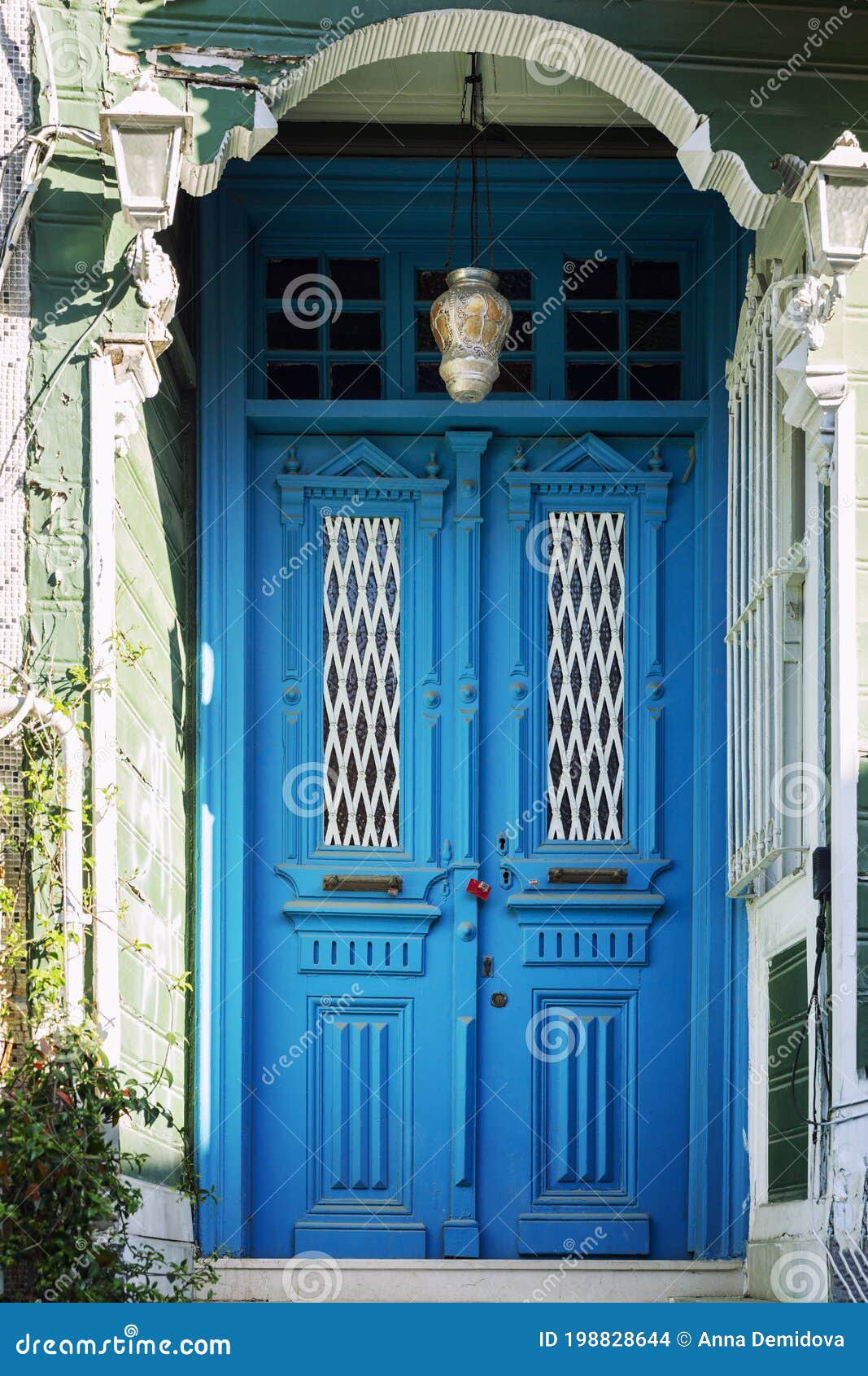 Blue Double Closed Door with an Old House. Close-up Stock Photo - Image ...