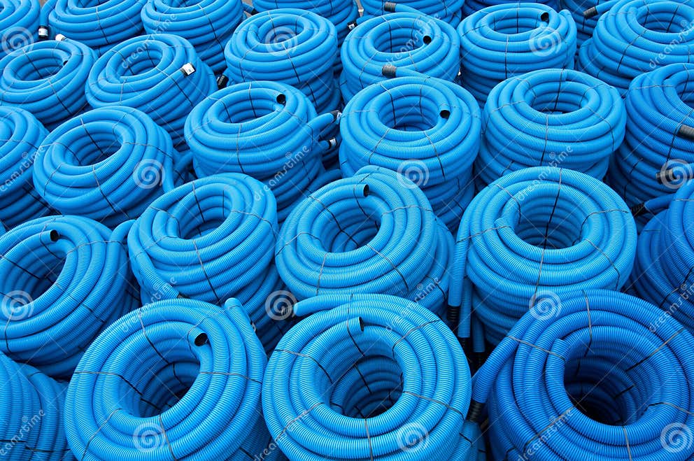 Blue drainage pipes stock photo. Image of blue, build - 21353868